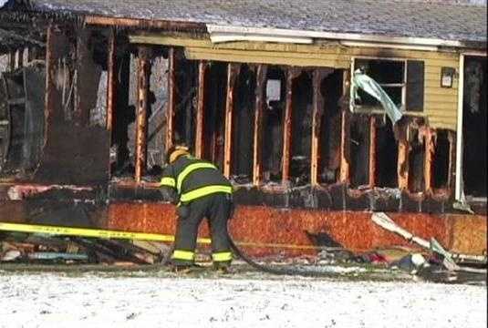 Photos: Four killed in northern Maine fire