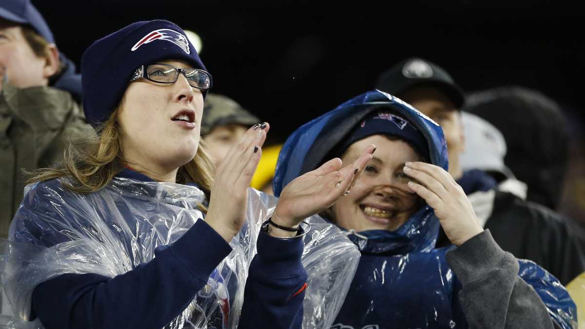Photos: Pats fans brave rain, celebrate AFC title