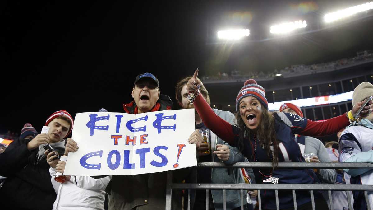 Photos: Pats fans brave rain, celebrate AFC title