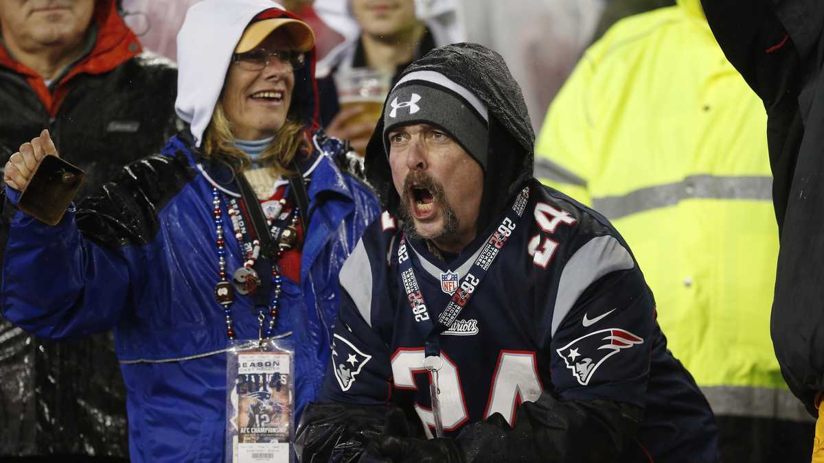 Photos: Pats fans brave rain, celebrate AFC title