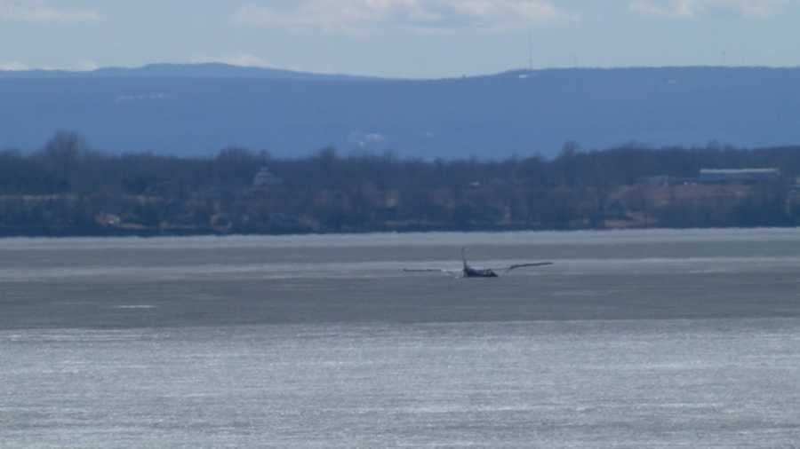 Small plane crash lands on frozen Lake Champlain