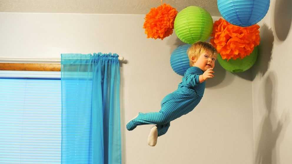 Photos show toddler with Down syndrome "flying" through life