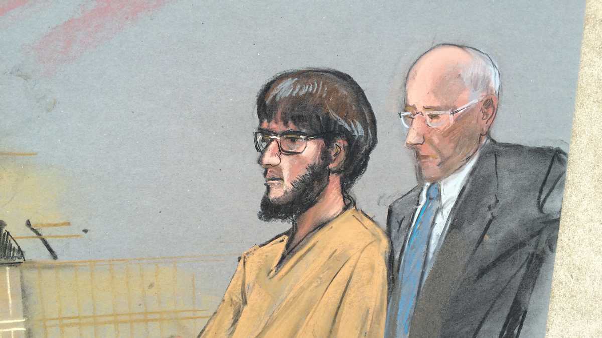 Officer's son charged in terror plot ordered held