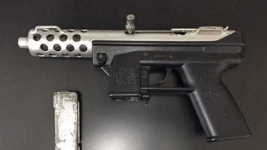 Man arrested for possession of machine gun and drugs