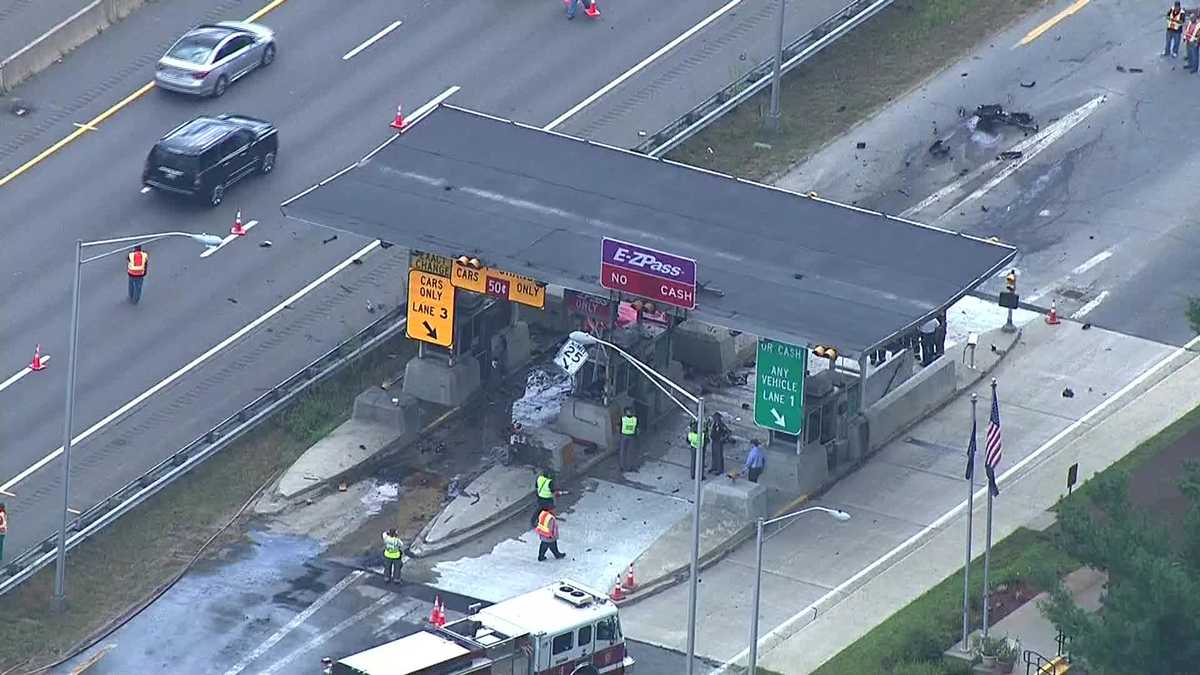 Photos: Car crashes into turnpike toll booth