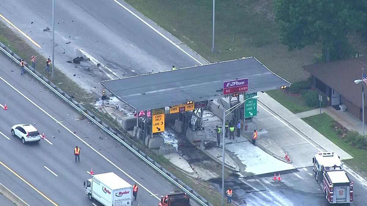 Photos: Car crashes into turnpike toll booth