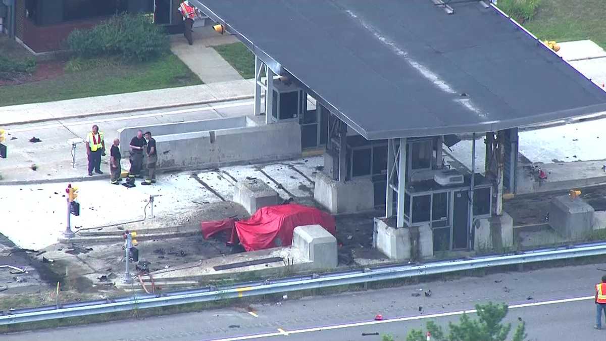 Photos: Car crashes into turnpike toll booth