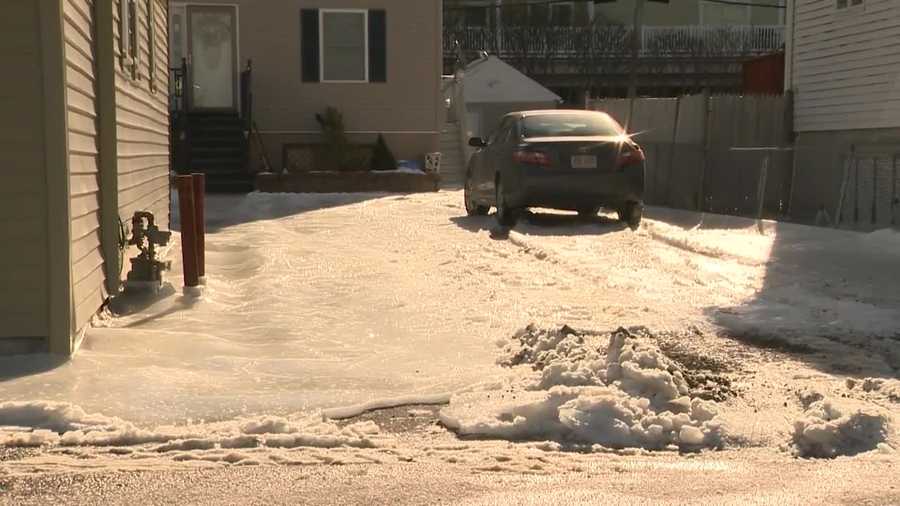 Ice covers neighborhood near stuck floodgate