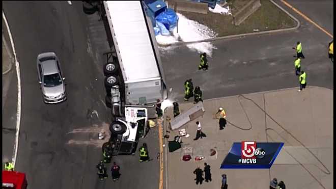 Dry ice spilled in tractor-trailer rollover