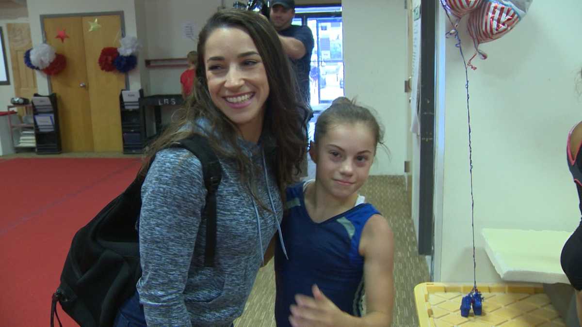 Olympic medalist Aly Raisman returns home to Massachusetts