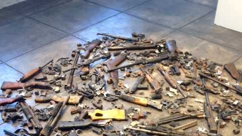Artists aim to take guns, transform weapons into art