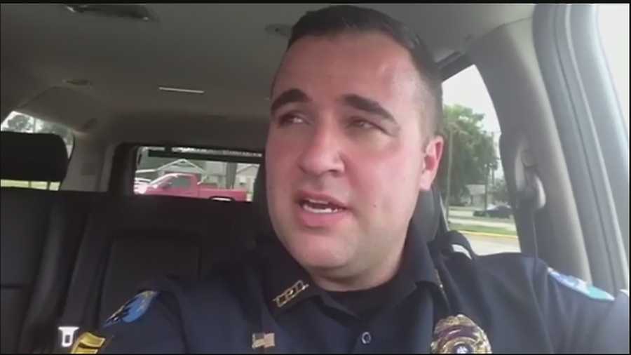 Thibodaux police officer underscores dangers of heat by sitting in ...