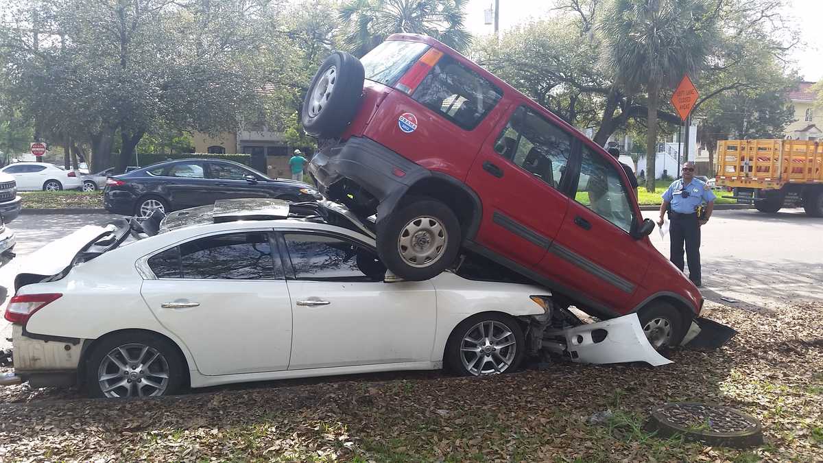 Images: Man rushed to hospital after being pinned between two parked ... Images: Man rushed to hospital after being pinned between two parked ...