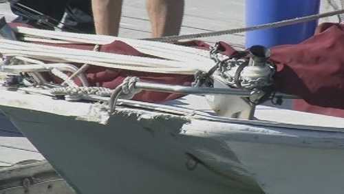 3 rescued after boat hits channel marker
