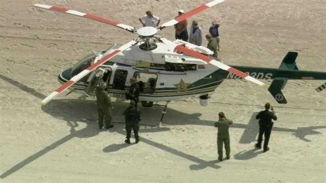 Images: Sheriff's helicopter makes emergency landing on beach