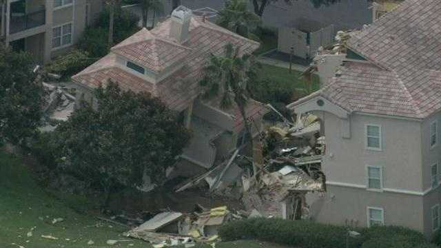 Images: Resort building falls into possible sinkhole