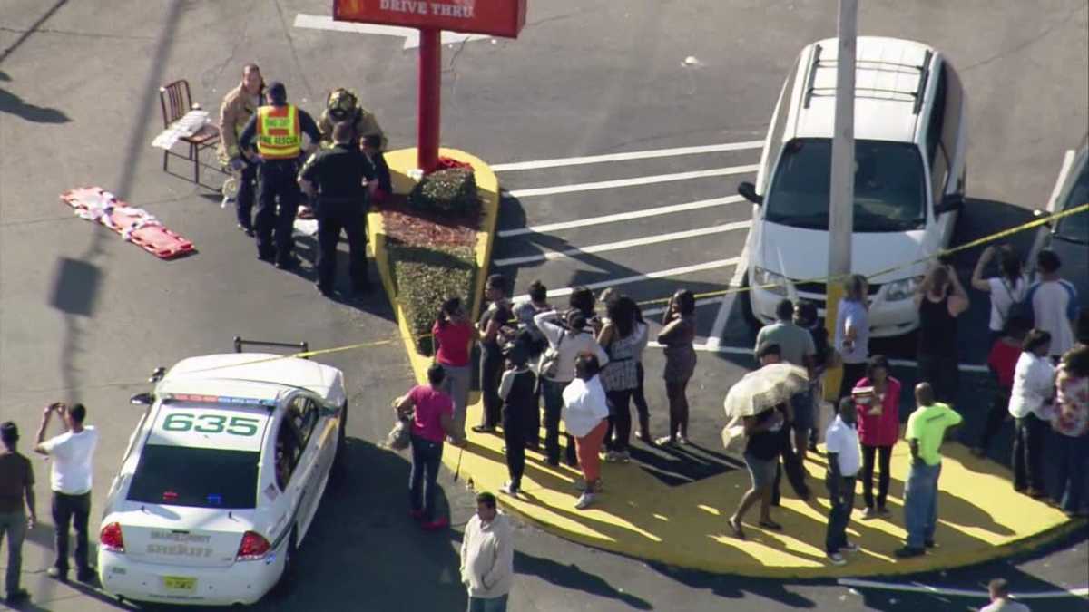 Photos: Vehicle crashes into Popeyes in Orlando