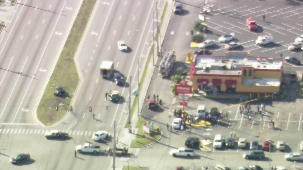 Photos: Vehicle crashes into Popeyes in Orlando