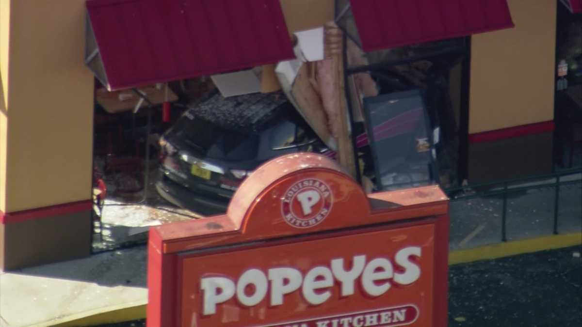Photos: Vehicle crashes into Popeyes in Orlando