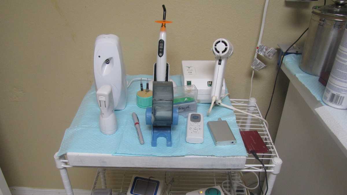 Photos: Inside accused fake dentist's home office