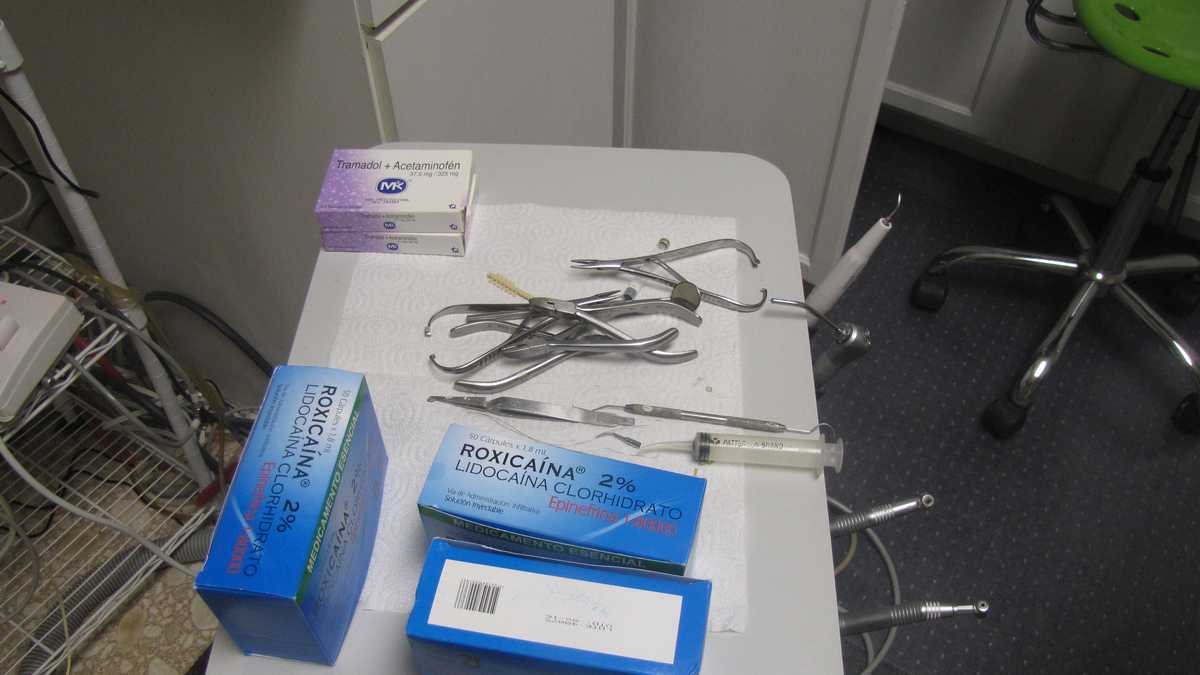Photos: Inside accused fake dentist's home office