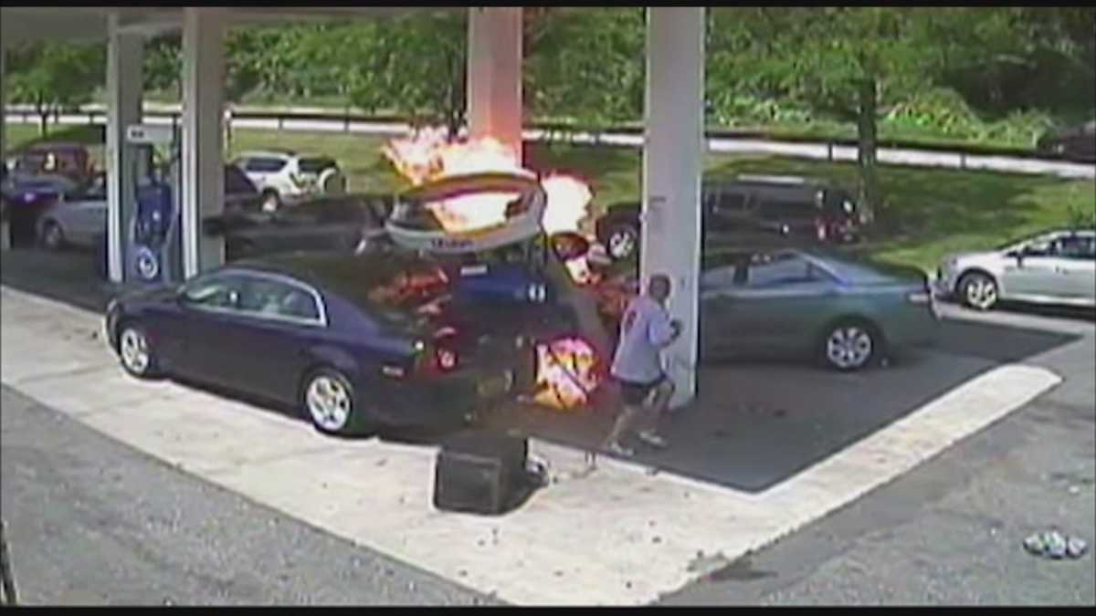 Fiery gas pump crash, rescue caught on camera