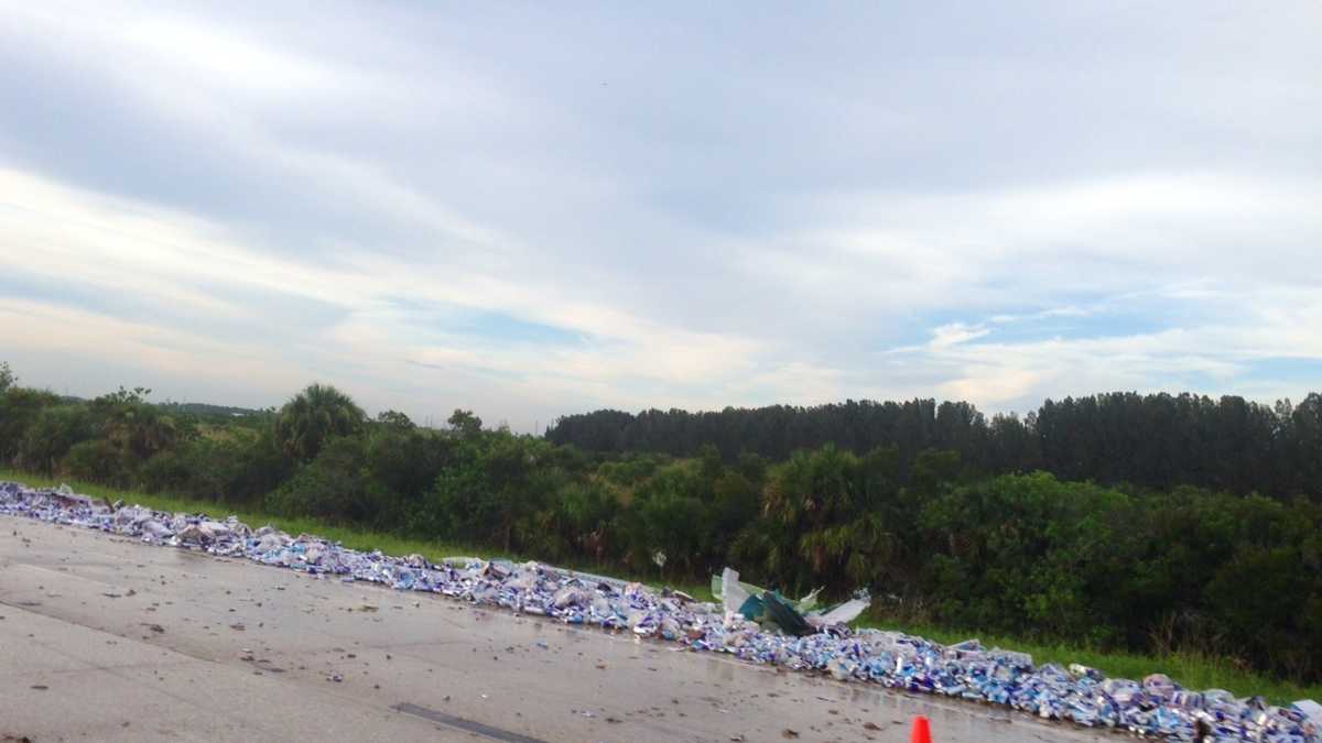 Photos: Red Bull cans spill onto I-95