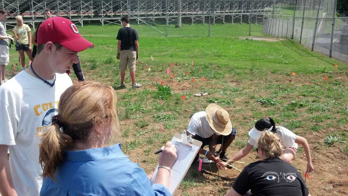 Students take part in mock archaeological dig