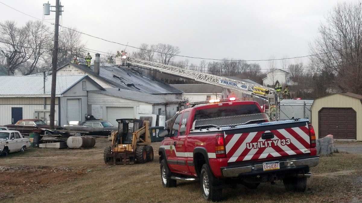 No one injured in auto body shop fire