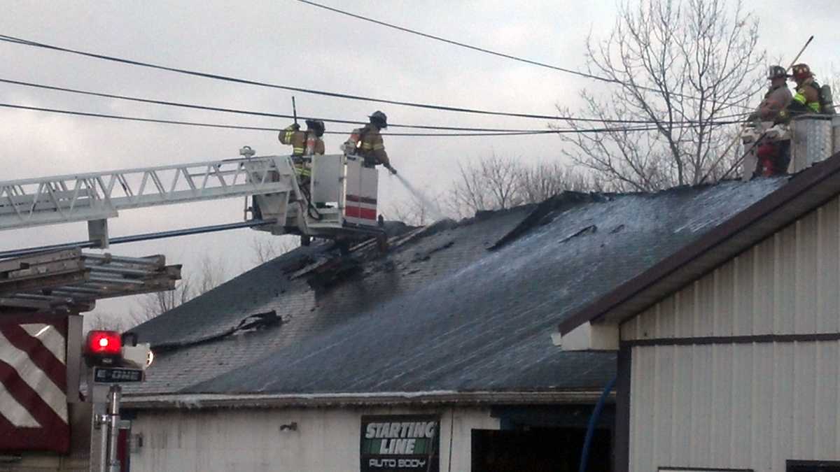 No one injured in auto body shop fire
