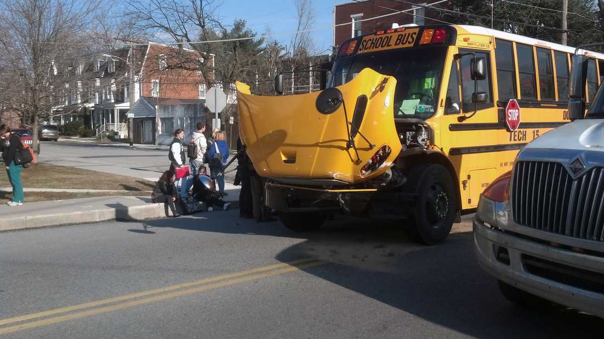 Minivan, school bus collide