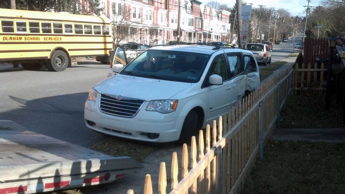 Minivan, school bus collide