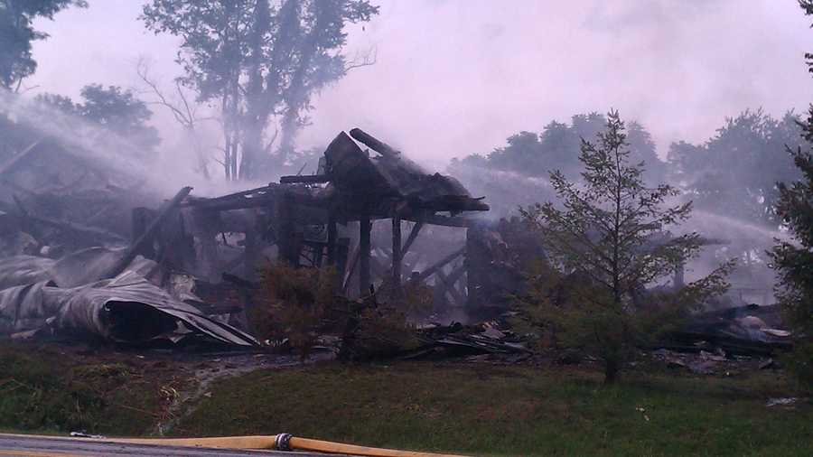 Photos: Fire destroys 100-year-old barn