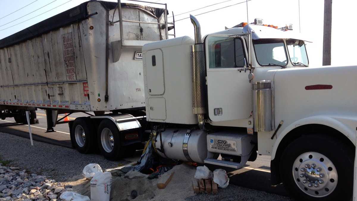 Diesel spills from truck hauling trash