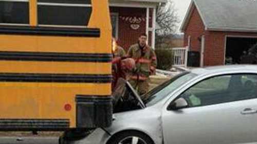 Car crashes into school bus