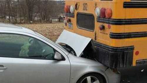 Car Crashes Into School Bus