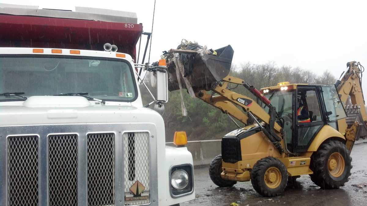 Photos: Garbage spills in interstate crash