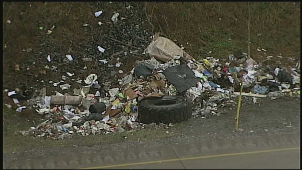 Photos: Garbage spills in interstate crash