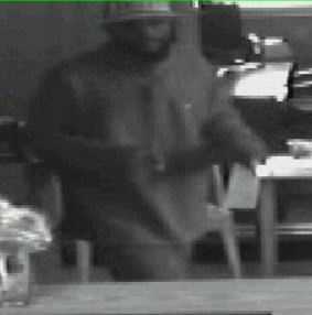 Man robs bank with box cutter, police say