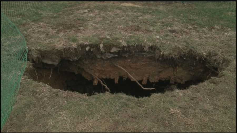 Backyard sinkhole uncovers underground structure