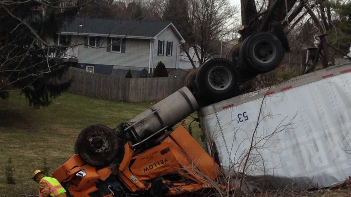 Photos: Tractor-trailer flips