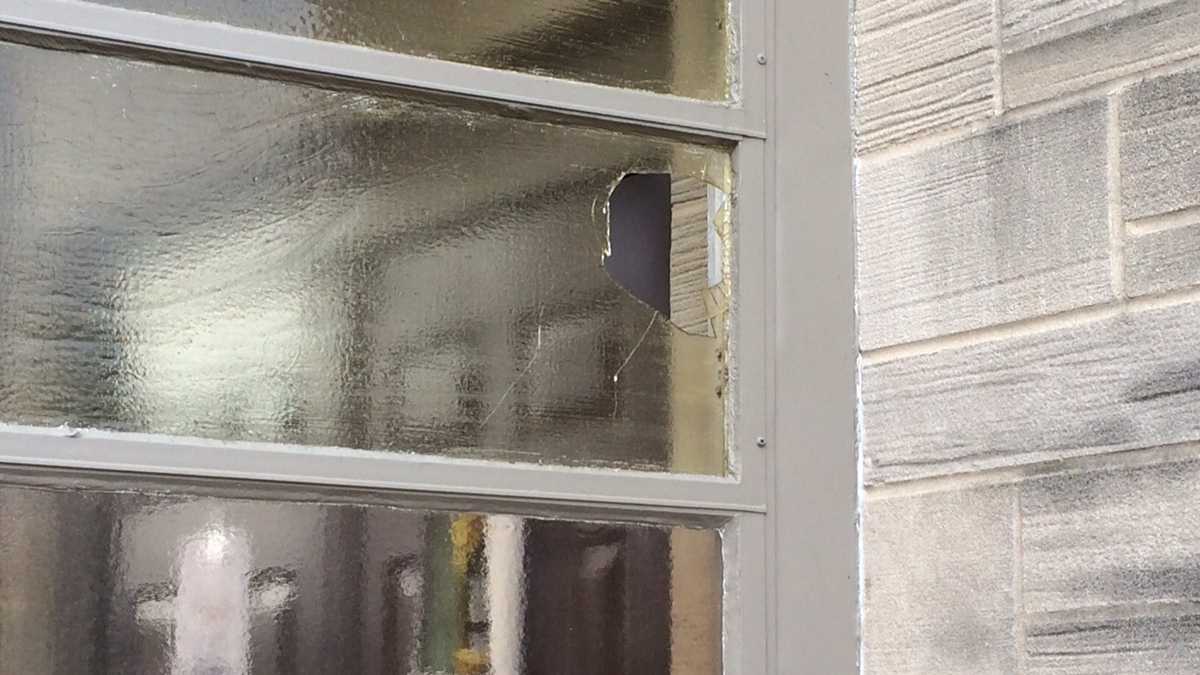 Photos: Rocks thrown through church windows