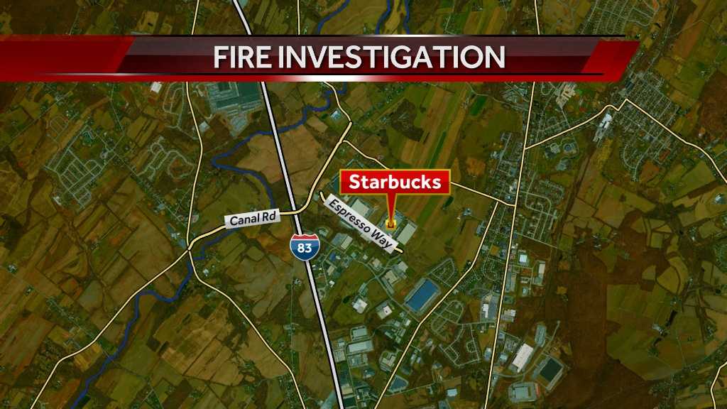 Crews battle fire at Starbucks