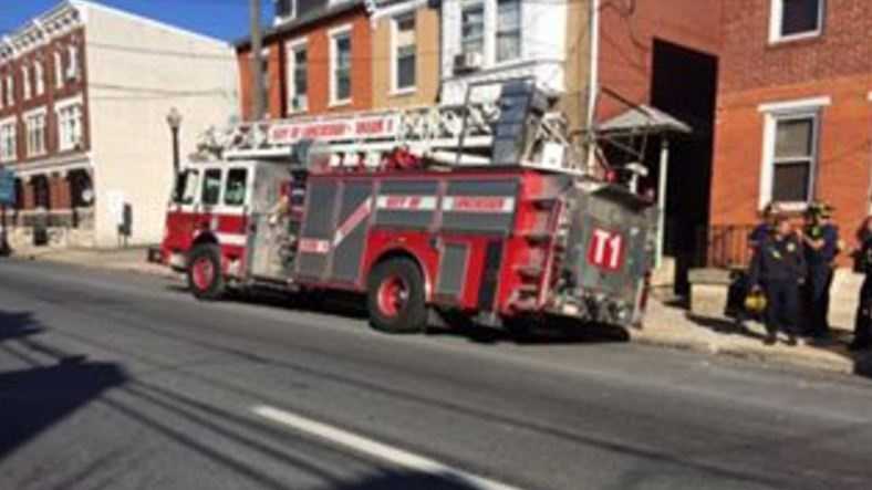 Fire truck stuck in Lancaster sinkhole; street closed off