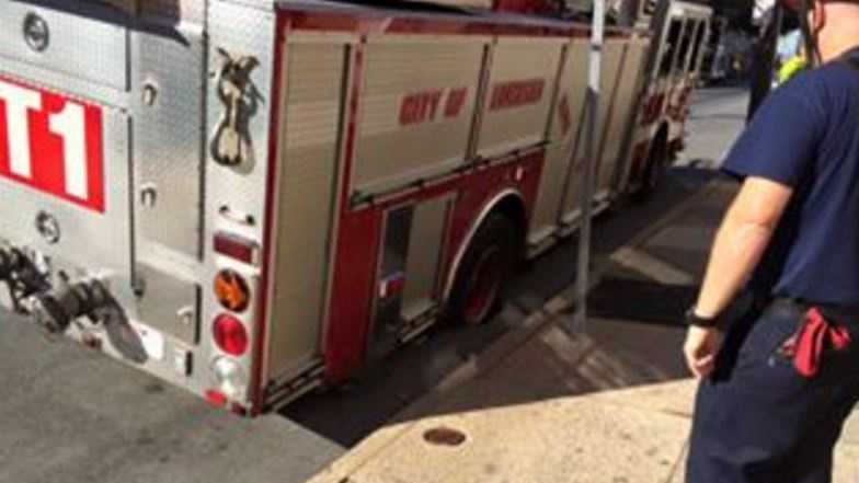 PHOTOS: Fire truck stuck in Lancaster sinkhole