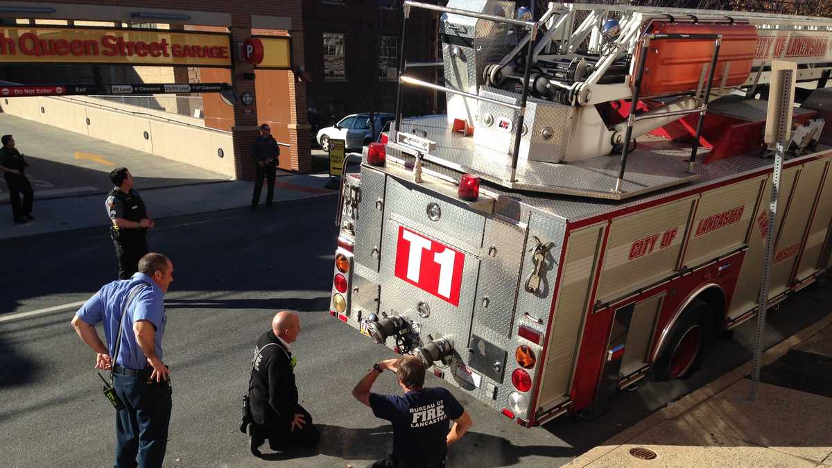 PHOTOS: Fire truck stuck in Lancaster sinkhole
