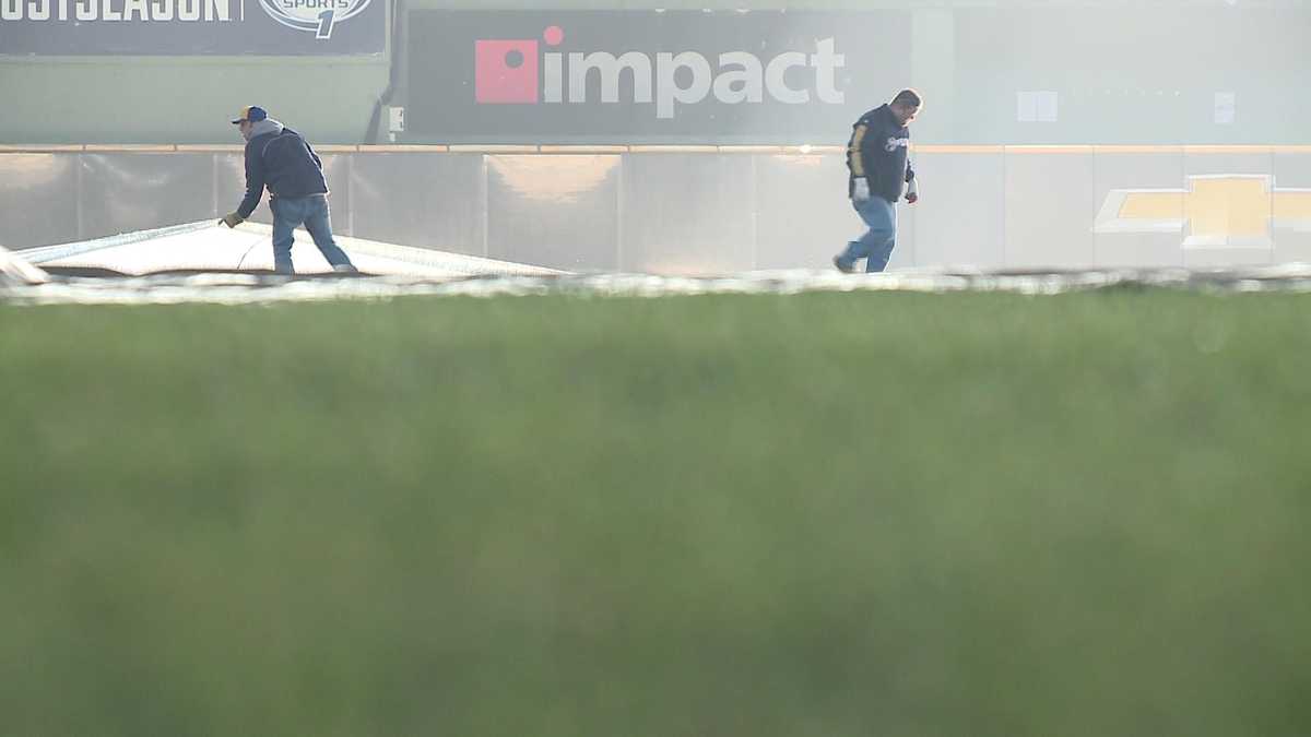 Signs of Spring: Removing the Miller Park tarp!