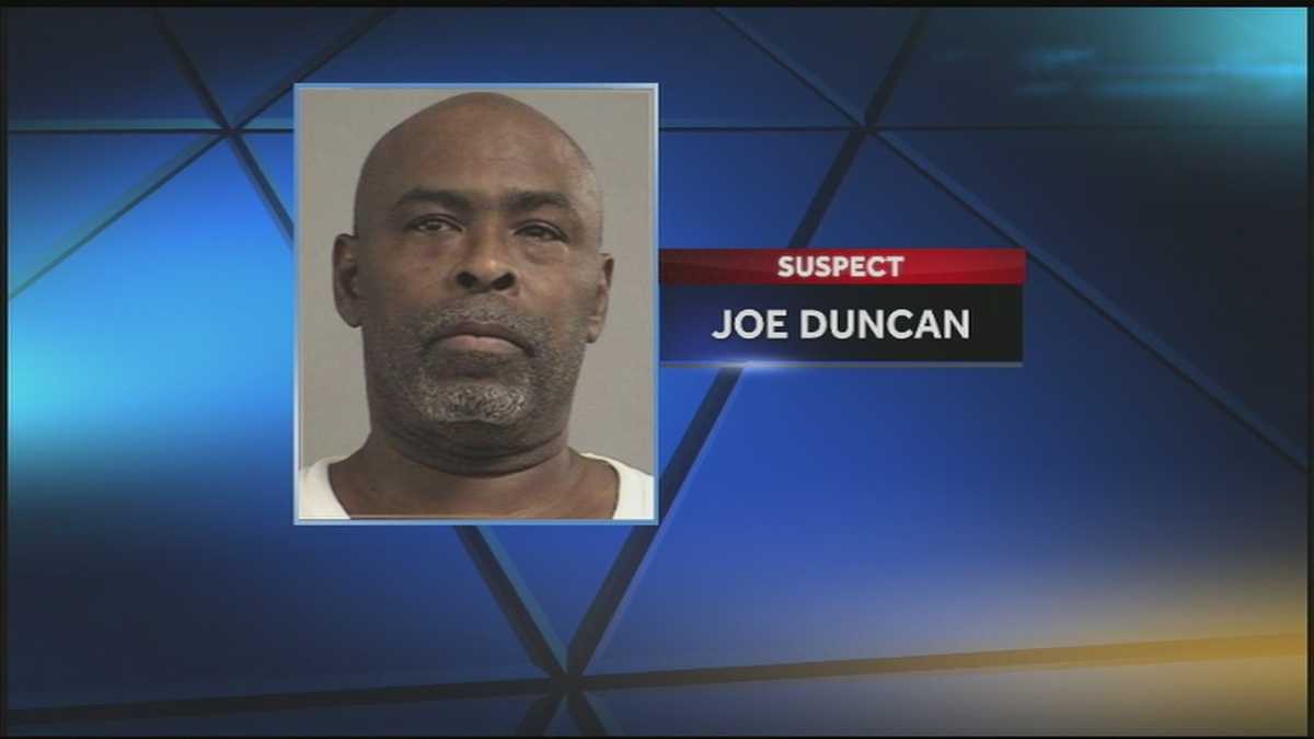 Man charged with murder after woman's body found in bed