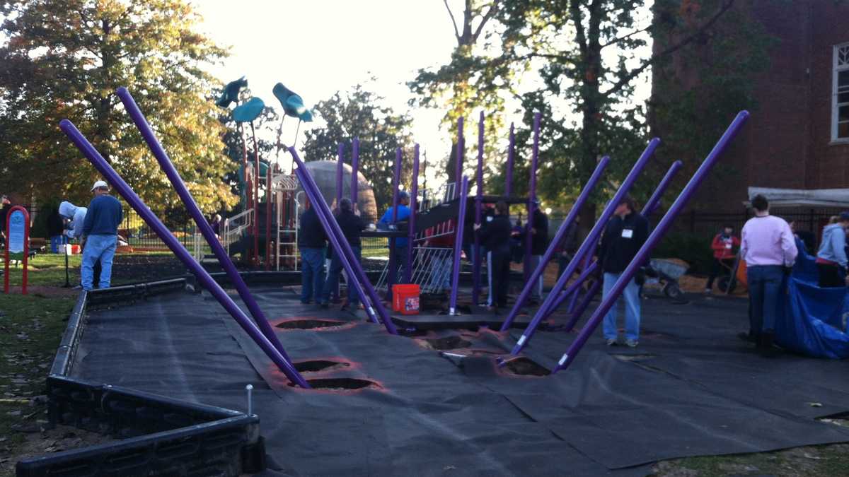 Images: Volunteers build playground for Louisville children