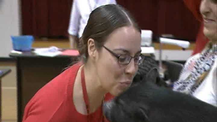 Maupin Elementary principal, teachers kiss pig at pep rally